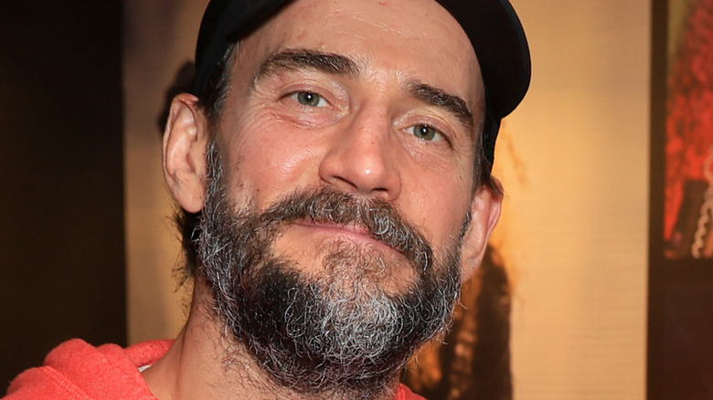CM Punk Reveals He Wore Another AEW Star's Boots At All Out CM Punk Reveals He Wore Another AEW Star's Boots At All Out