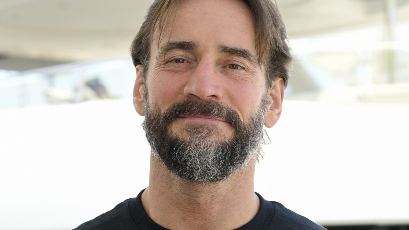 Daniel Cormier Likens CM Punk's WWE Return To UFC Hall Of Famer Coming ...