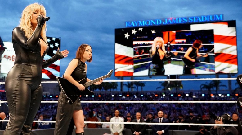 "Do Not Slap Leg When Kicking" Sign Appears In Backstage 'Mania Video