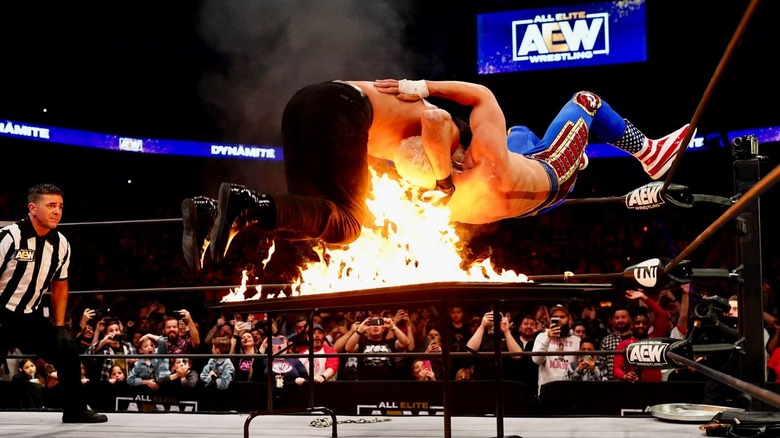 Graphic Photos Of Cody Rhodes' Back After AEW Dynamite Flaming Table Spot