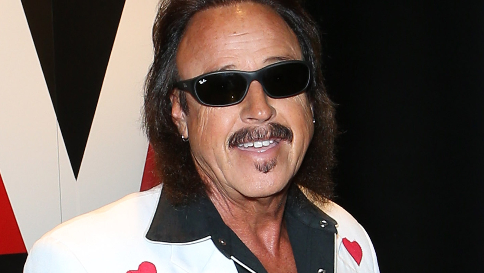 How A Tour With The Beach Boys Helped Inspired Jimmy Hart's Flashy Persona