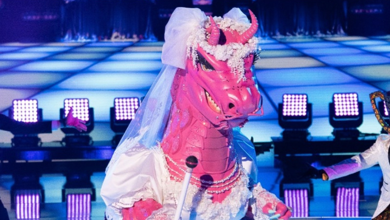 Top AEW Star Rumored To Be 'Bride' On Masked Singer