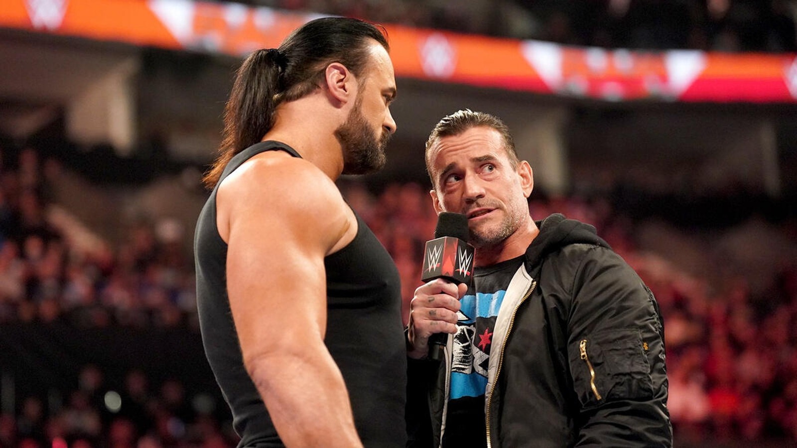 Video: CM Punk Autographs Young WWE Fan's Hilarious Sign, Drew McIntyre Weighs In